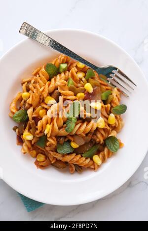 Whole wheat fusilli Pasta Arrabbiata with vegetables. Vegetable Pasta ...