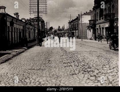 Main Street in Kowel, Ukraine, captured during World War I, showing the ...