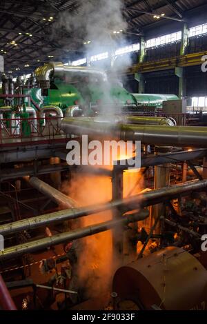 Aksu, Pavlodar region, Kazakhstan: Heat power station. Red cones of ...