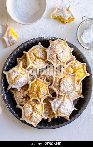 Saffron ricotta pastries (Pardulas Stock Photo - Alamy