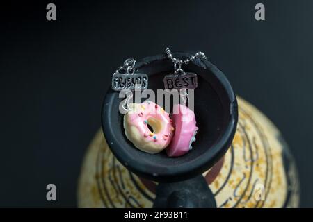 Pendant set of best friends two colors heart necklace shoot outside in ...