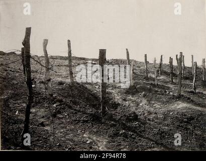 Destroyed wire lubries and explosive funnel Stock Photo - Alamy