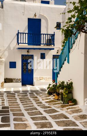 Mykonos stone walkways and Cycladic architecture draped in Bougainville ...