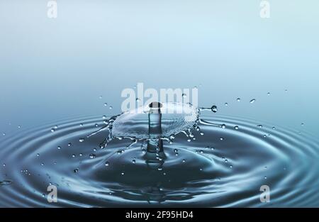 splash of the falling drops of water, collision drops Stock Photo - Alamy