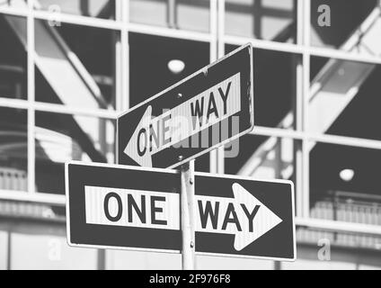 A black and white 'one way' road sign Stock Photo - Alamy