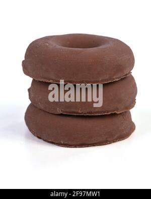 Small chocolate circle cookies on white background Stock Photo - Alamy