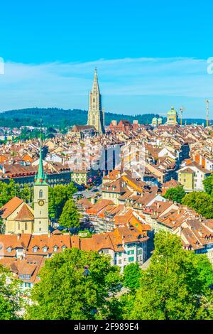 Aerial view of Bern dominated by Münster cathedral and Bundeshaus ...
