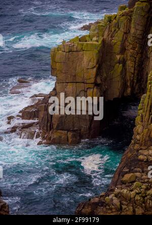 Famous cliffs at the coastline of Lands End Cornwall Stock Photo - Alamy