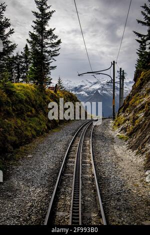 Cog railway train tracks in the Swiss Alps Stock Photo - Alamy