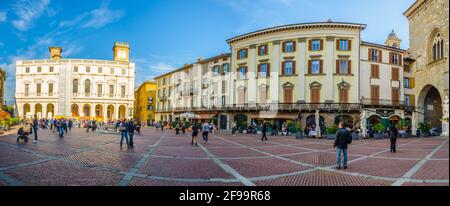 BERGAMO, ITALY, NOVEMBER 2, 2014: People are strolling through Piazza ...
