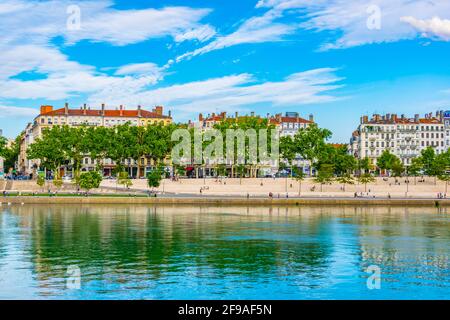 LYON, FRANCE, JULY 23, 2017: People are passing by statue of Louis XIV ...