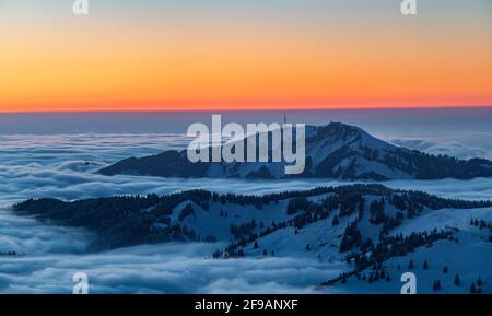 Clouds over the mountains. After sunset Stock Photo - Alamy