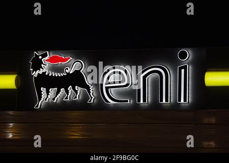 ENI SpA logo is illuminated on the company's service station in Imperia ...