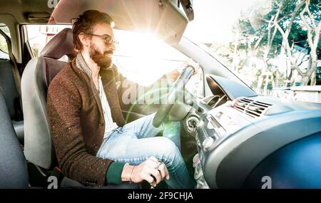 lifestyle young man with mustache, car, rock n roll Stock Photo - Alamy