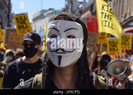 Man wears a Guy Fawkes Mask popular with anonymity to disguise his ...