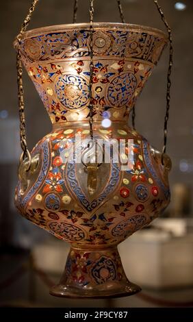 A 14th-century enamelled glass lamp from a mosque, showcasing the ...