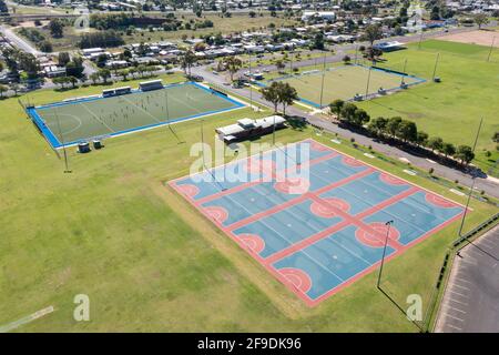 Drone aerial photograph of colourful netball courts and large sports ...