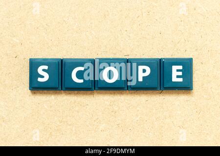 Alphabet letter in word scope on wood background Stock Photo - Alamy