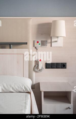 Nurse call system with emergency buttons installed near bed in medical ...