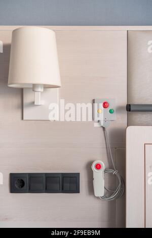 Nurse call system with emergency buttons installed near bed in medical ...