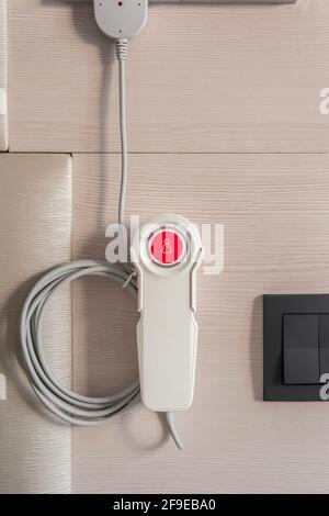 Nurse call system with emergency buttons installed near bed in medical ...