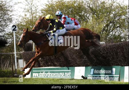 Getawaytonewbay ridden by Stan Sheppard (front) goes on to win The ...