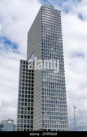One South First Street, an apartment tower, leans on Ten Grand Street ...