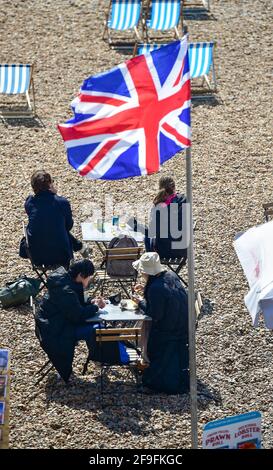 Brighton UK 18th April 2021 - Bar staff supply the drinks as Brighton ...