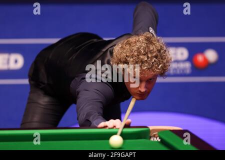 Neil Robertson of Australia plays a shot to Kyren Wilson of England at ...