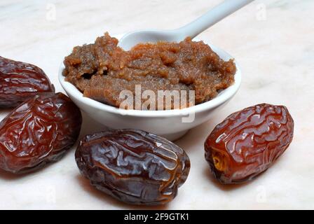 Dried dates, date cream in shell (Phoenix dactylifera) , date puree ...