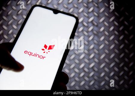 In this photo illustration, the Equinor logo is displayed on a ...