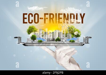 Waiter serving eco cityscape concept Stock Photo - Alamy