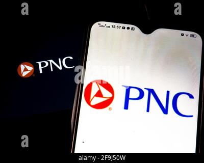 In this photo illustration, PNC Financial Services Group logo seen ...