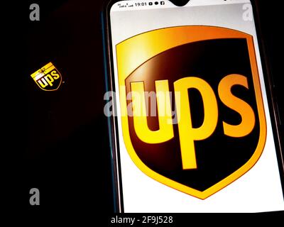 In this photo illustration, the United Parcel Service, Inc. (UPS) logo ...
