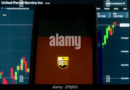 In this photo illustration, the United Parcel Service, Inc. (UPS) logo ...