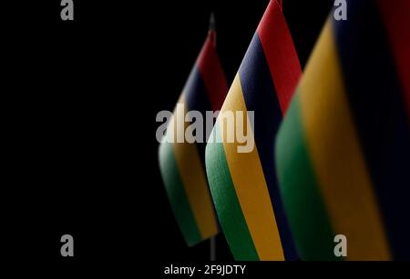 Small national flags of the Mauritius on a black background Stock Photo ...