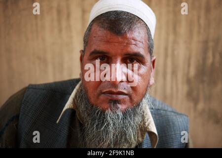 Bearded Pathan man from Swat, Pakistan with Indian Muslim man Stock ...