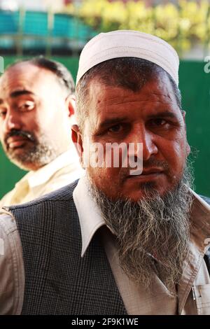 Bearded Pathan man from Swat, Pakistan with Indian Muslim man Stock ...