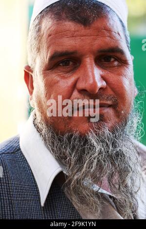 Bearded Pathan man from Swat, Pakistan with Indian Muslim man Stock ...