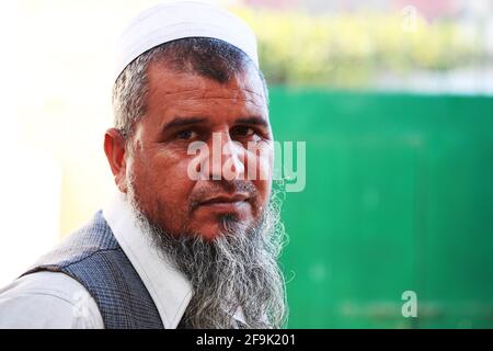 Bearded Pathan man from Swat, Pakistan with Indian Muslim man Stock ...