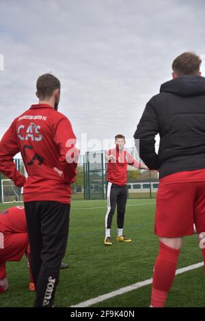 football coach talking to footballer Stock Photo - Alamy
