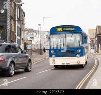 Bus number 100 with registration plate FDV 787V vintage bus driving ...