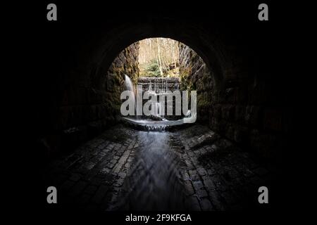 Creepy dark eerie old sewer brick tunnel spooky water river running ...
