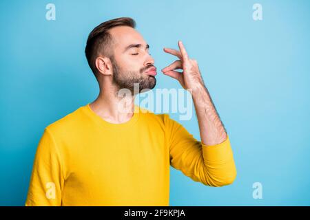 man with pouted lips showing gourmet sign with fingers tasty Stock ...