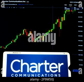 In this photo illustration, the Charter Communications logo is seen ...