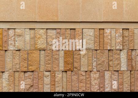 Modern Limestone (Kasota Stone) Brick Wall Background with Varying ...