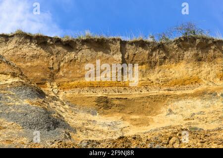View of part of Britain's Jurassic coast , cliffs, red crag and london ...
