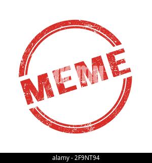 MEME text on red round grungy texture stamp Stock Photo - Alamy
