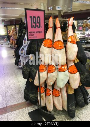 Hamon Store At Supermarket in Barcelona, Spain. Jamon of different ...