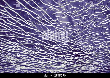Broken glass window detail with multiple layers on brick building Stock ...